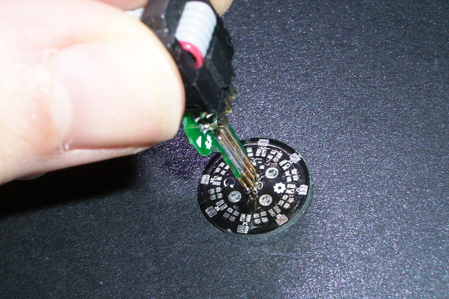 Tiny AVR-ISP pogo-pin programming adapter from madworm on Tindie